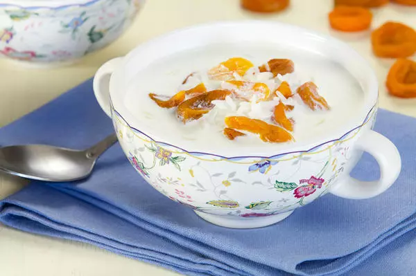 Cutting soup with rice and dried