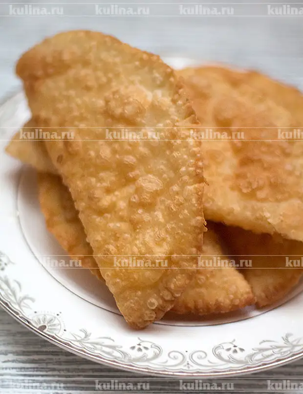 Submit chebureks to the table. Delicious!