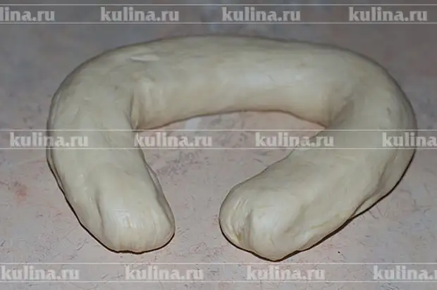 Prepare the dough for Chebureks. Dough roll out in the form of sausages.