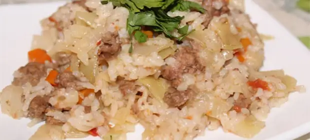 Rice with cabbage and meat in a slow cooker